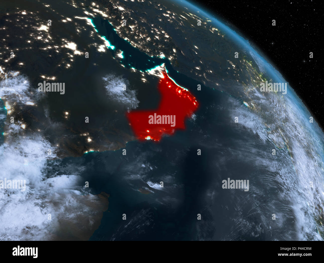Night above Oman highlighted in red on model of planet Earth in space ...