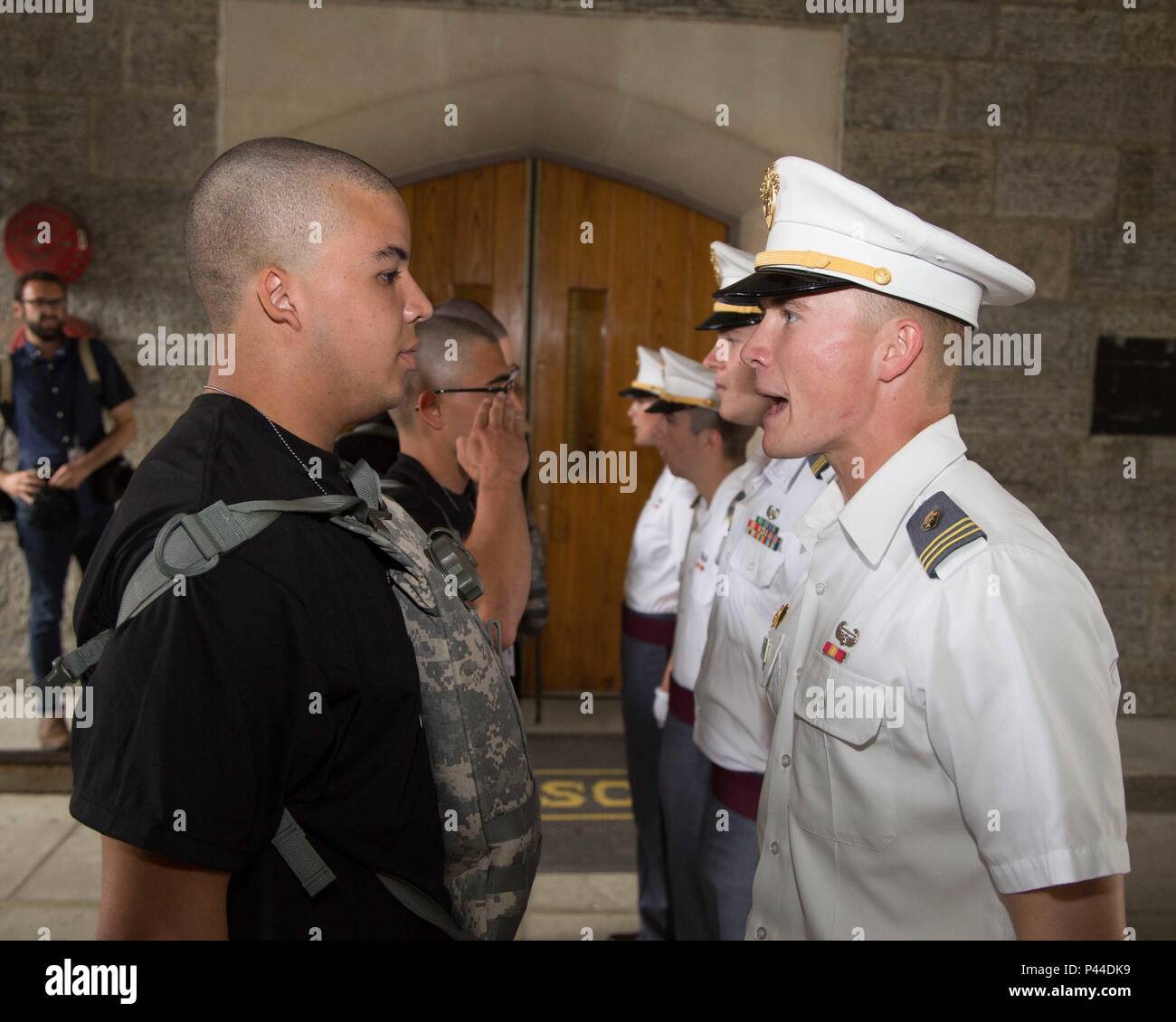 A new cadet reports to the cadet in the red sash during the U.S ...