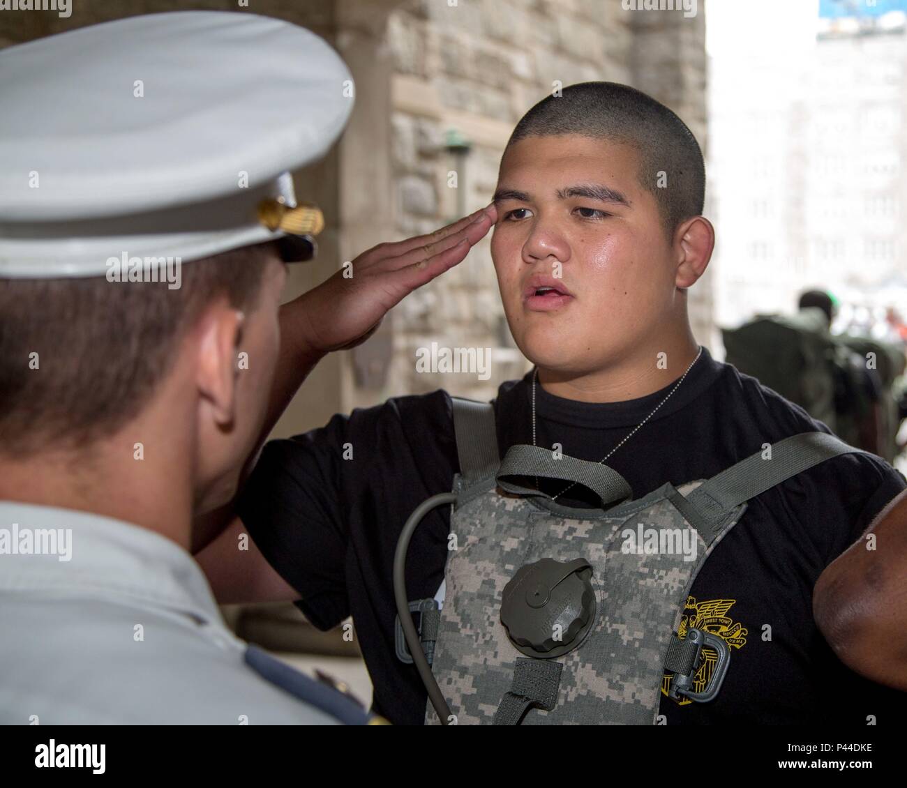 A new cadet reports to the cadet in the red sash during the U.S ...