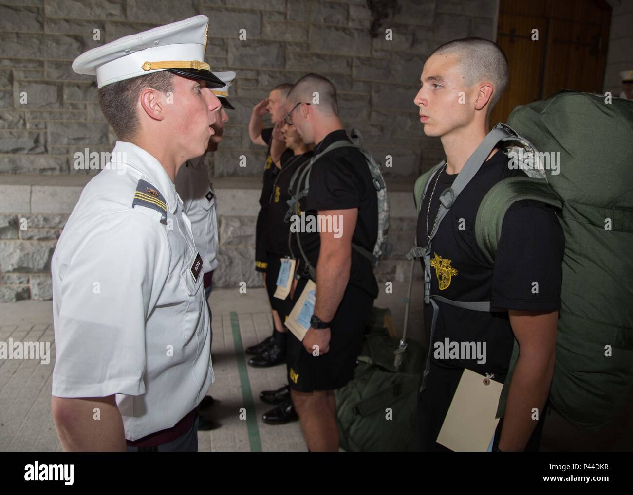 A new cadet reports to the cadet in the red sash during the U.S ...