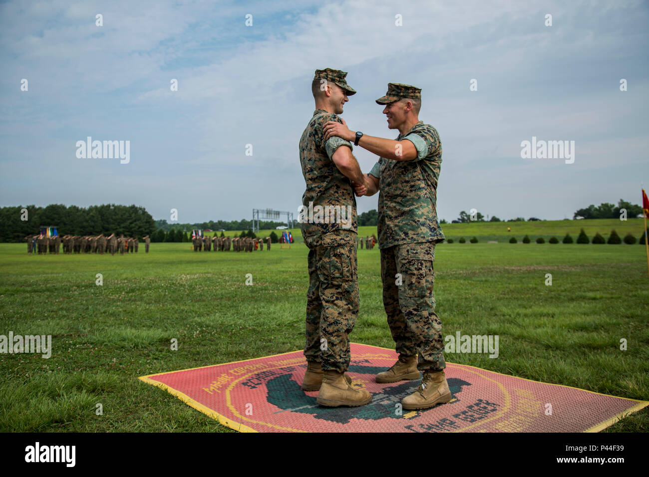 U.S. Marine Corps Lt. Col. Robert M. Hancock, right, the outgoing ...