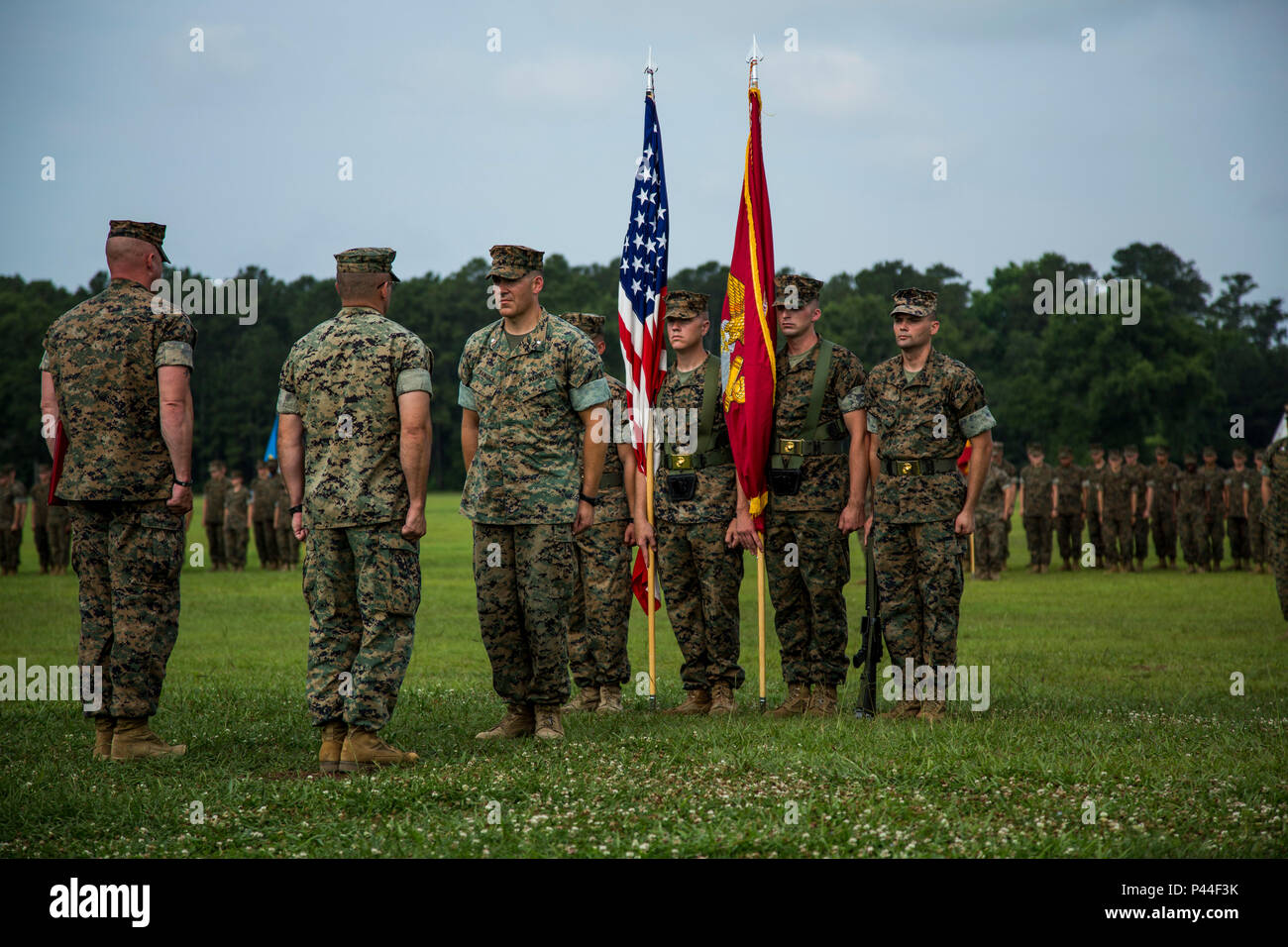 U.S. Marine Corps Col. Steven M. Wolf, second from left, commanding ...