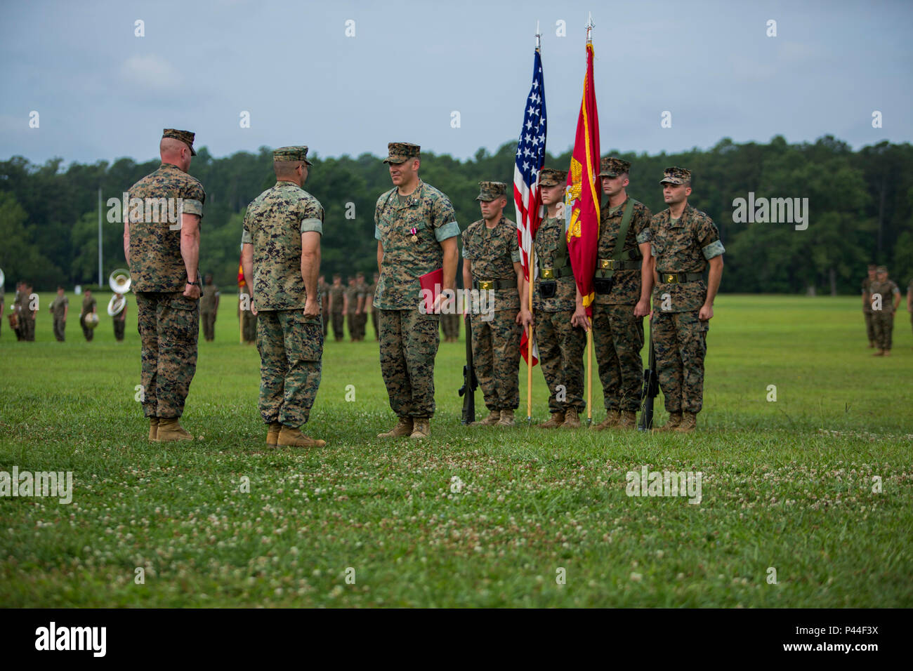 U.S. Marine Corps Col. Steven M. Wolf, second from left, commanding ...