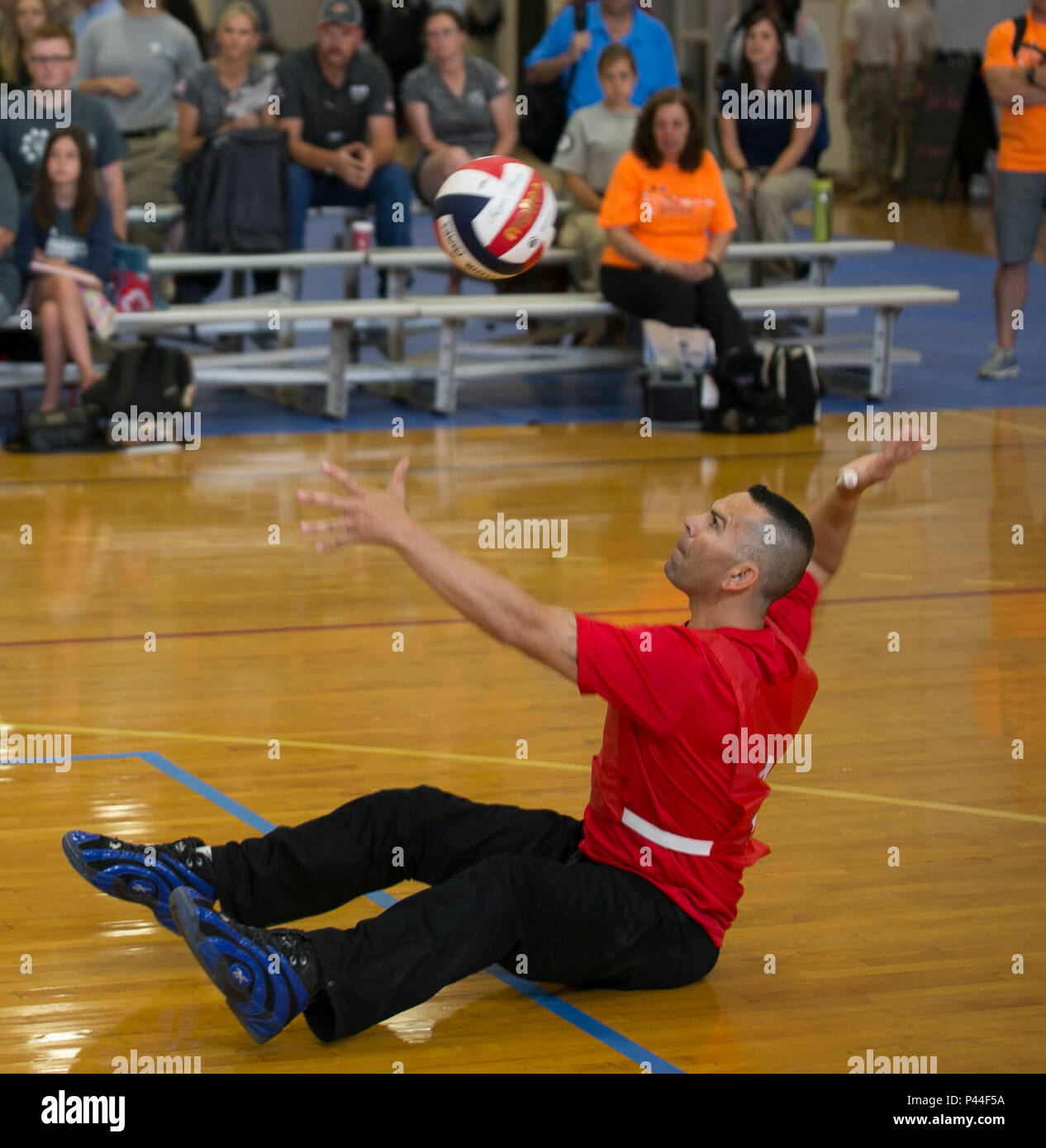 U.S. Marine Corps Gunnery Sgt. Andrew Cordova sets up to serve against ...