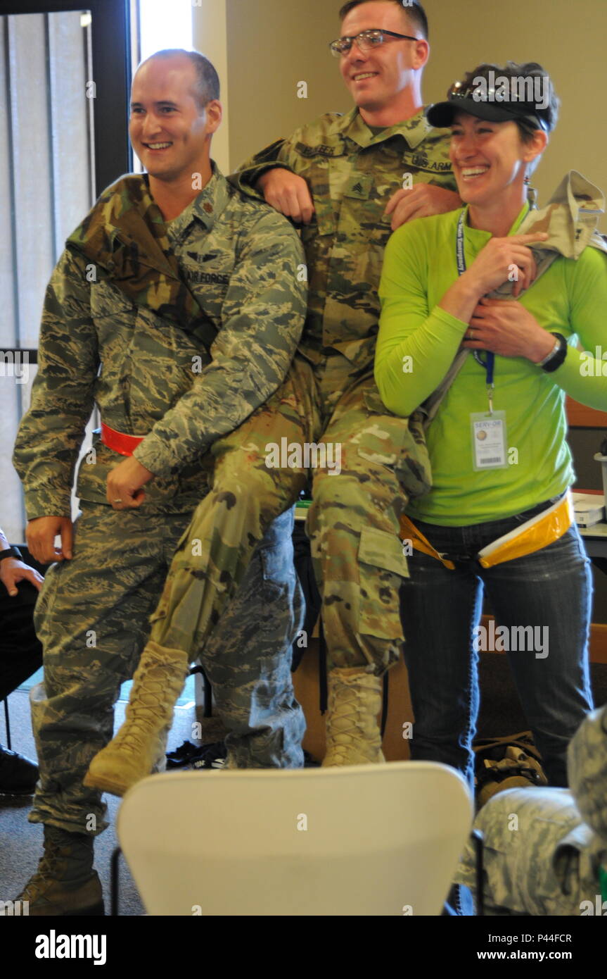 Kentucky Army Guard Sgt. Ryan Hunter is buddy-lifted by members of the ...
