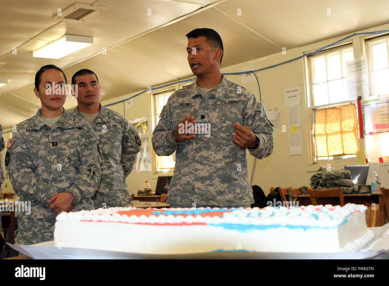 Lt. Col. Romeo Delfin, center, commander, 1st Battalion, 294th Infantry ...