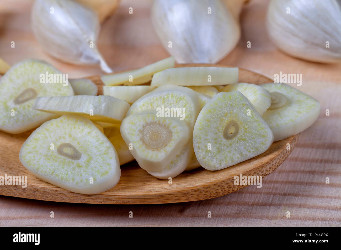 Chopped garlic ready to cook and flavor many recipes Stock Photo - Alamy
