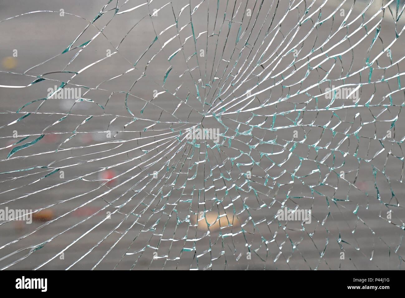 Broken window and cracked glass damage Stock Photo - Alamy
