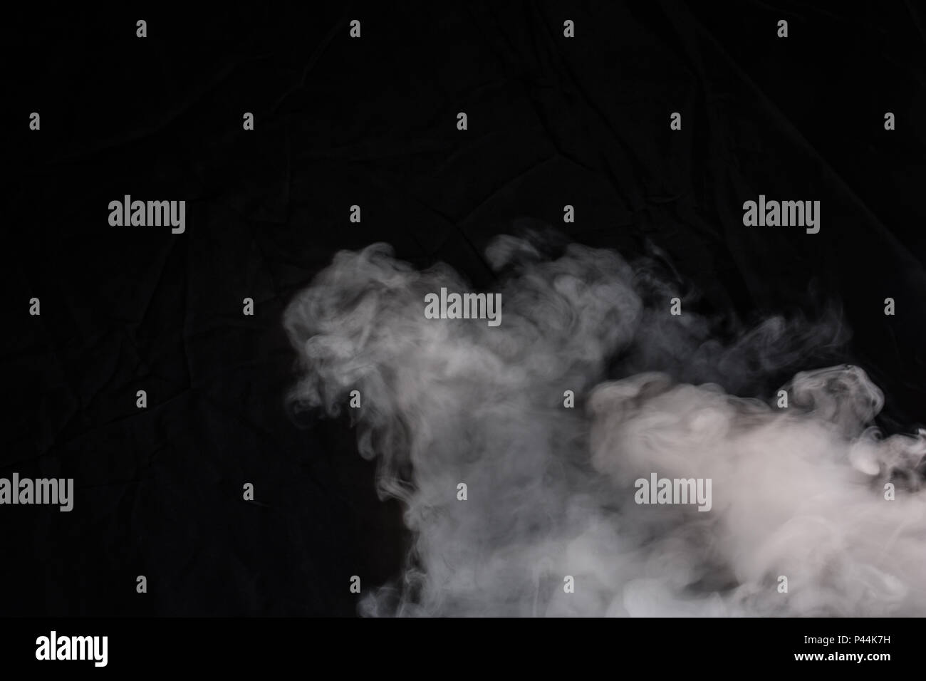 Movement of smoke isolated on black background Stock Photo - Alamy