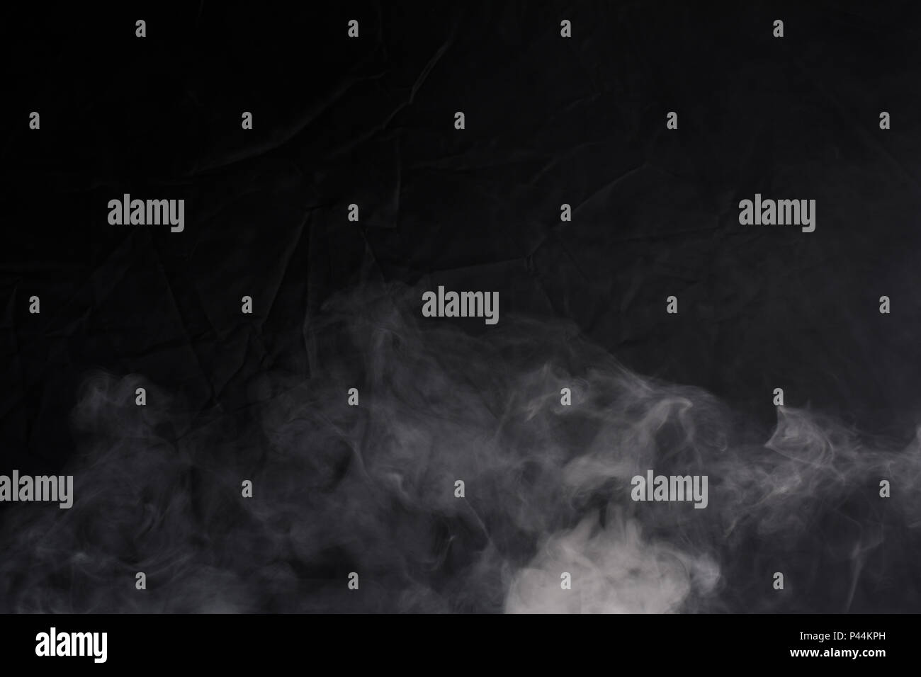 Movement of smoke isolated on black background Stock Photo - Alamy