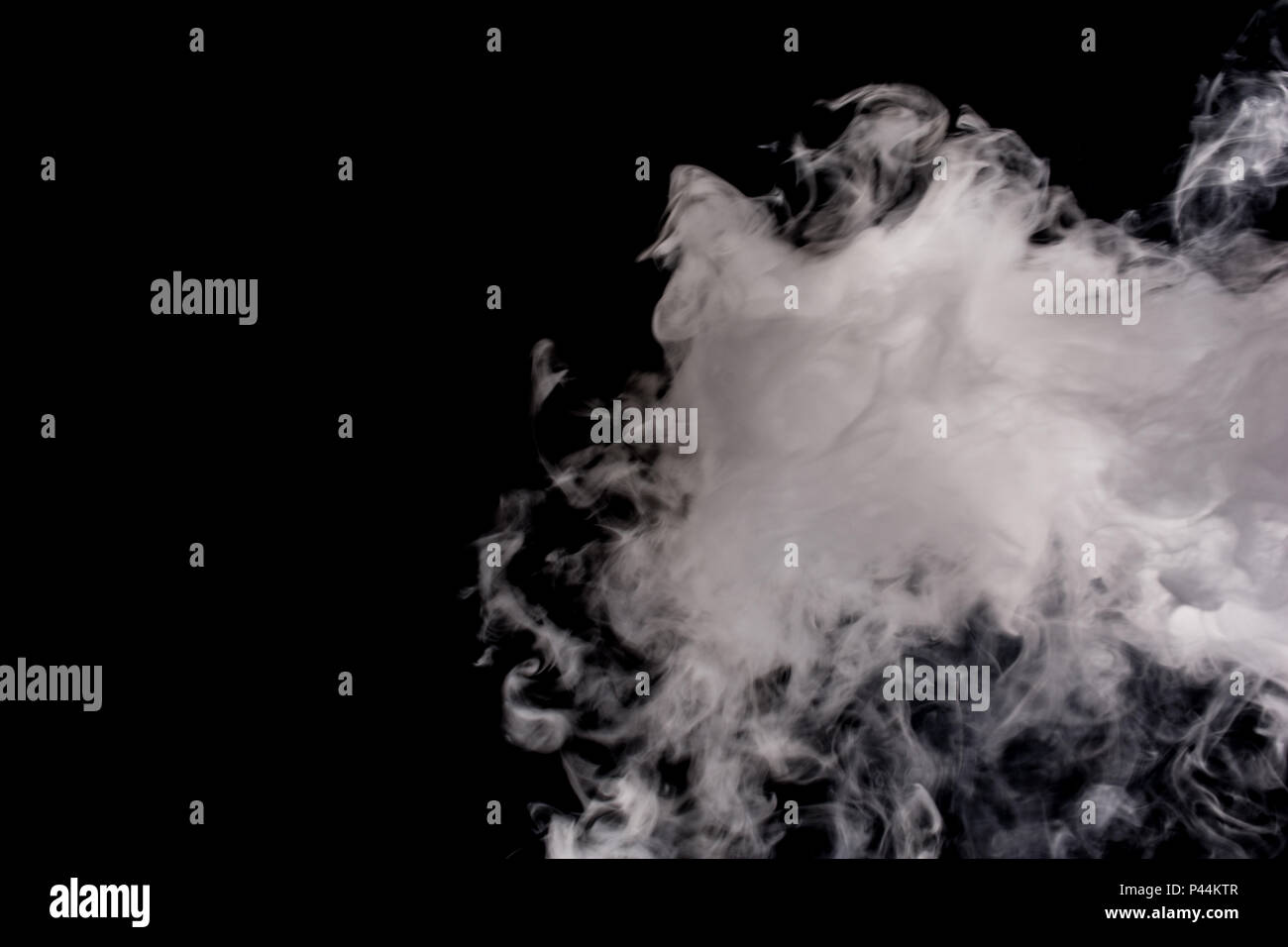 Movement of smoke isolated on black background Stock Photo - Alamy