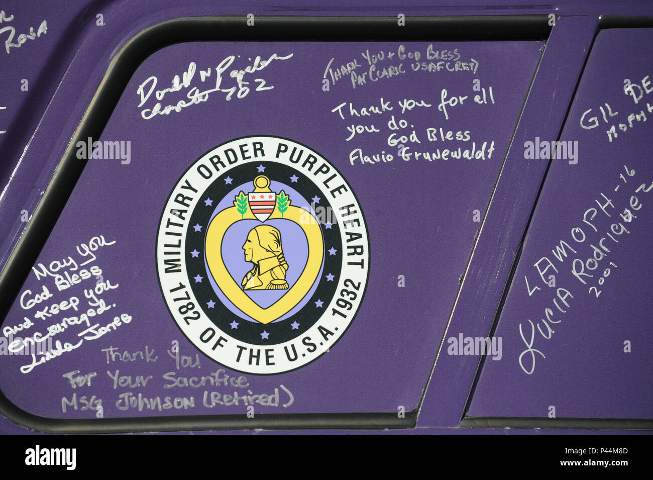 Signatures of supporters on the Purple Heart Foundation vehicle. The ...