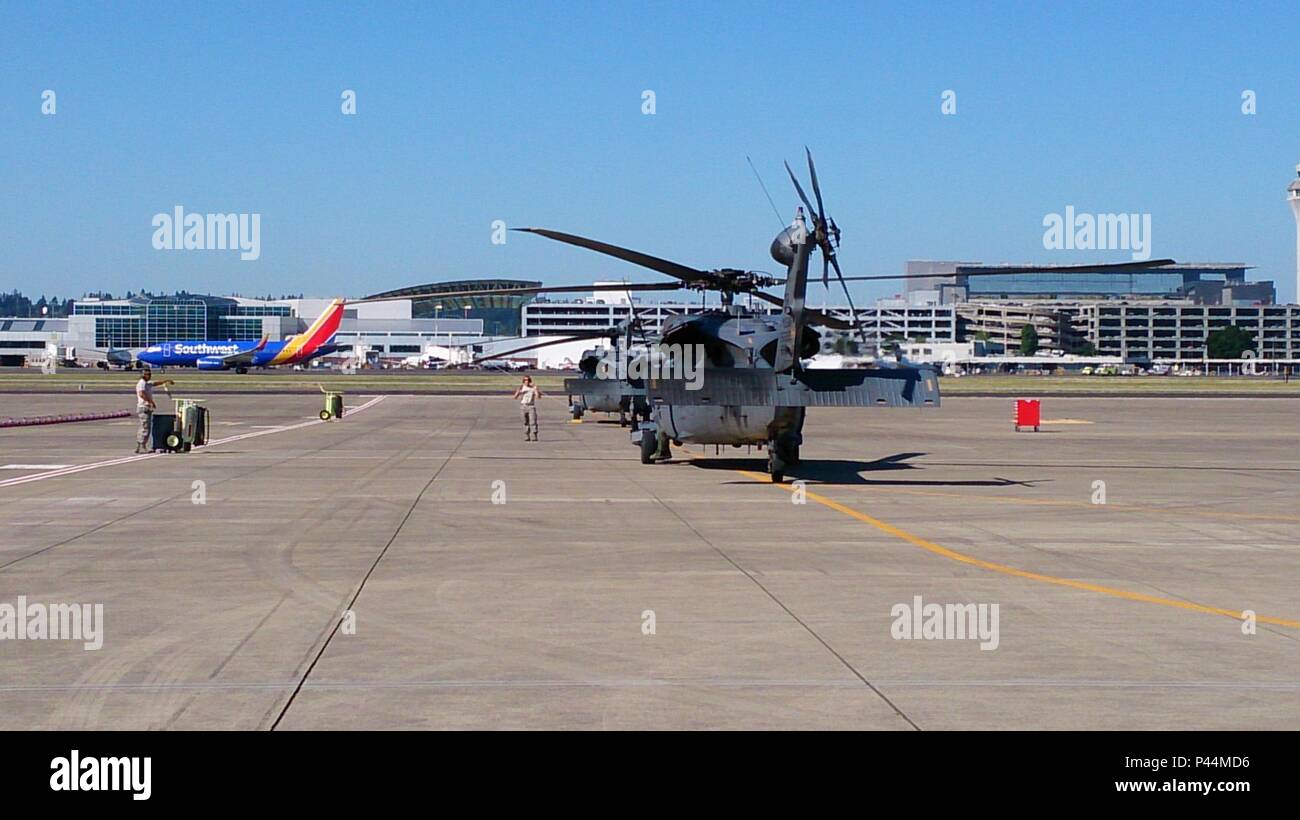 A 305th Rescue Squadron HH-60 and 79th Rescue Squadron HC-130J are ...