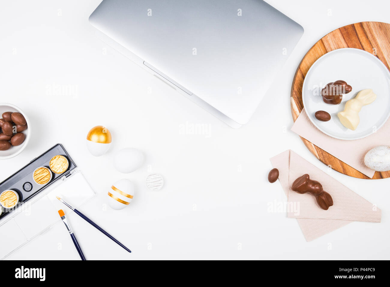 Happy Easter. Stylish stationery background with chocolate eggs. gold ...