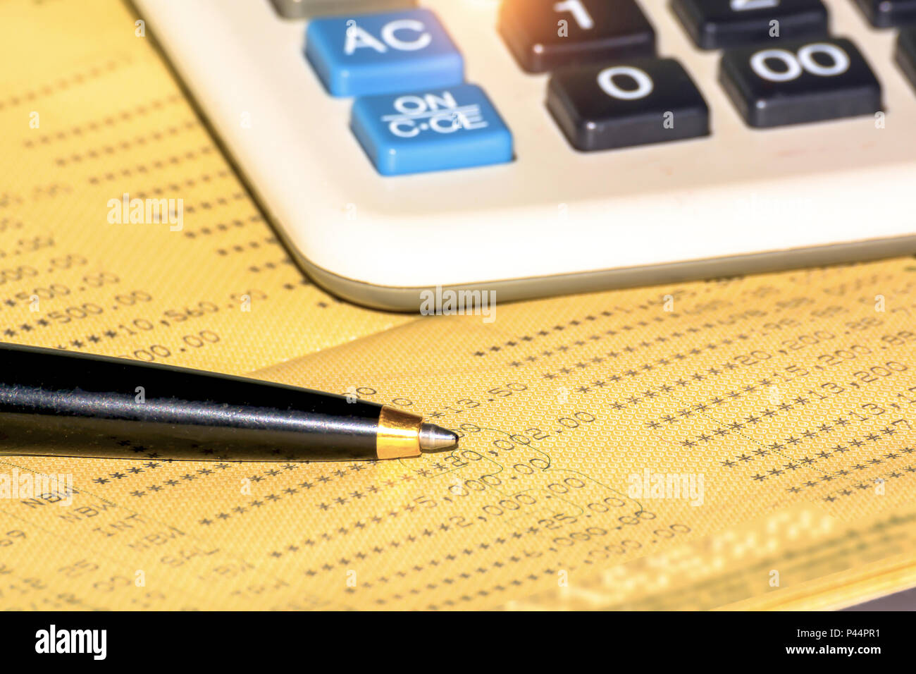 Business background,Bank account passbook with pen and calculator Stock ...