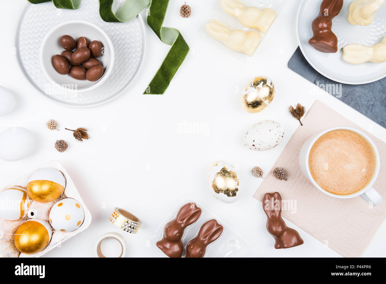 Happy Easter. Stylish stationery background with chocolate eggs. gold ...