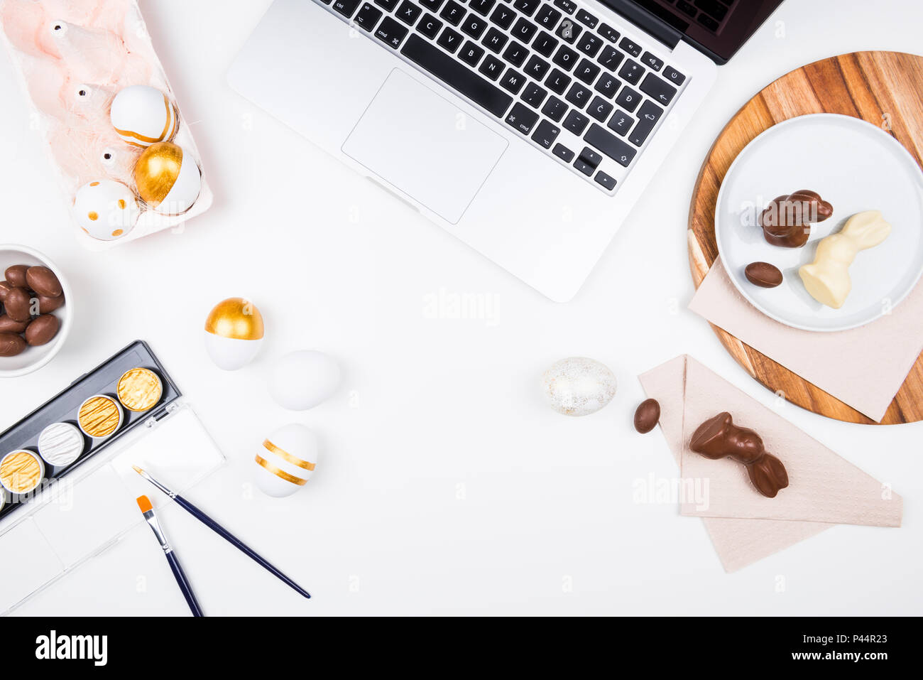 Happy Easter. Stylish stationery background with chocolate eggs. Gold ...