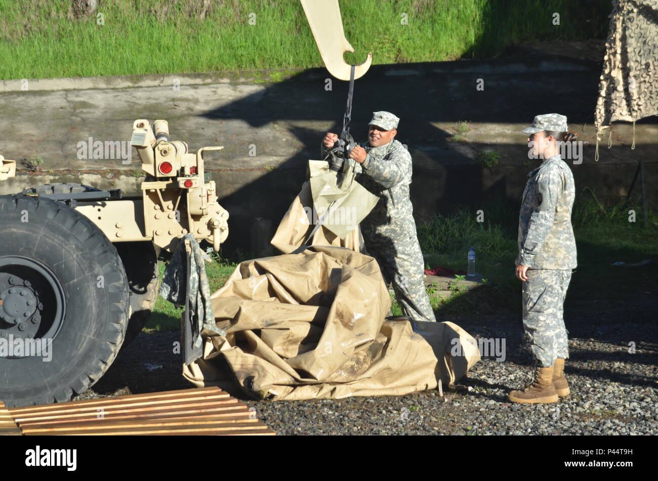 U.S. Army Soldiers SGT Ramos Jose, on left and PFC Melissa Mullikin ...