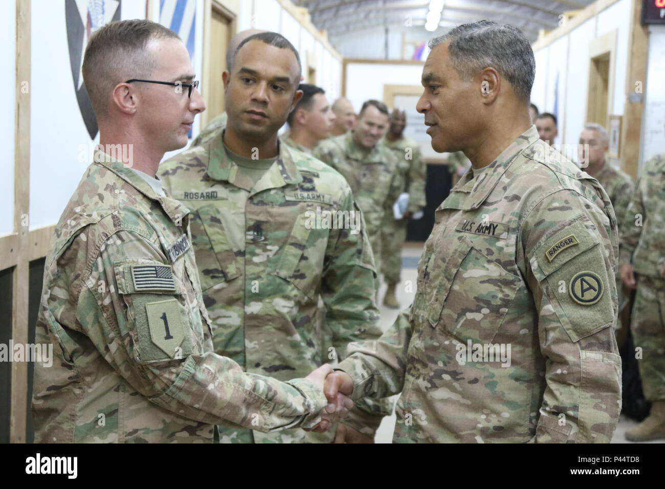 Lt. Gen. Michael X. Garrett (right), commanding general of U.S. Army ...