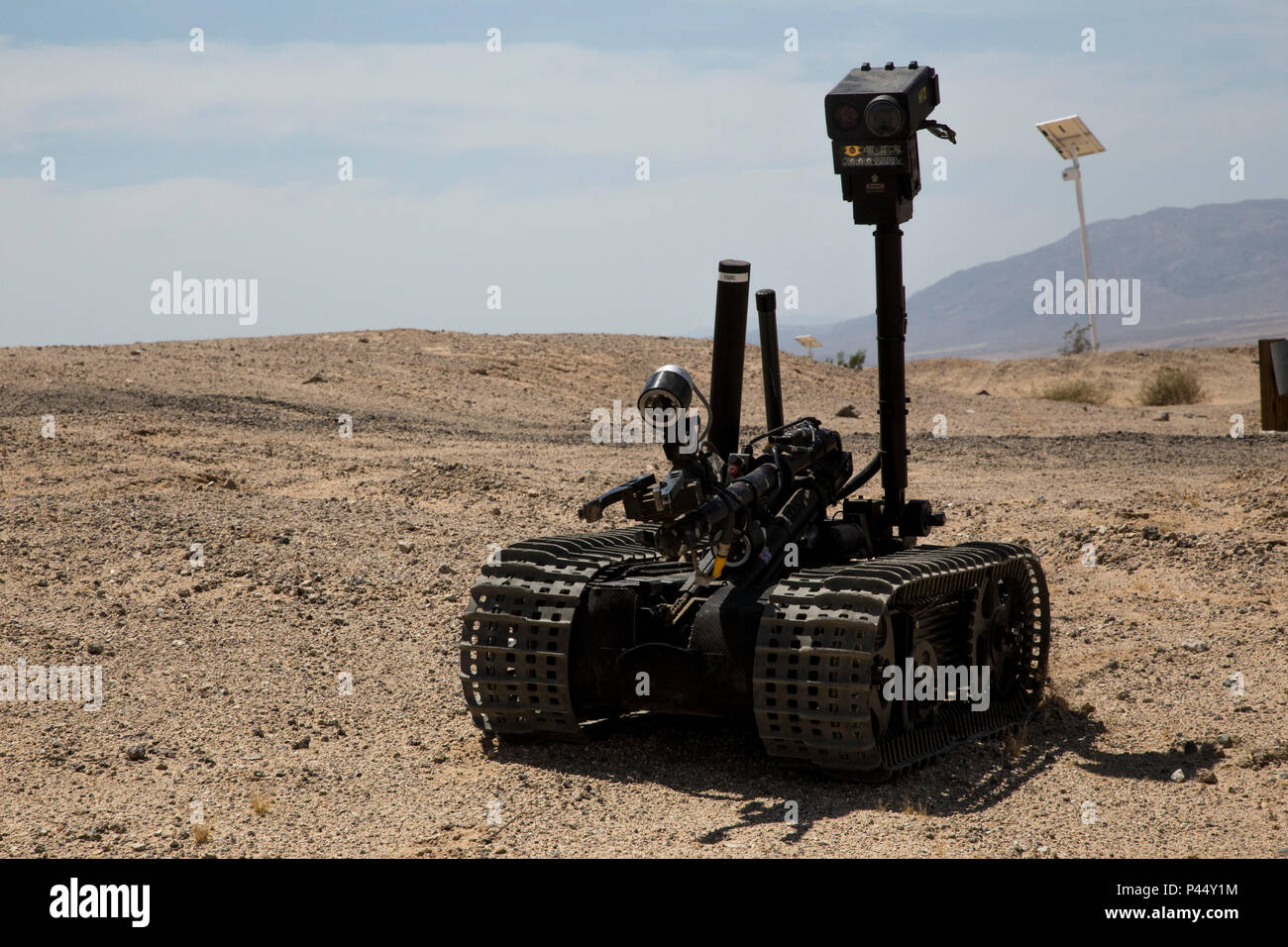 A Talon man-transportable robotic system uses its camera to scan the ...