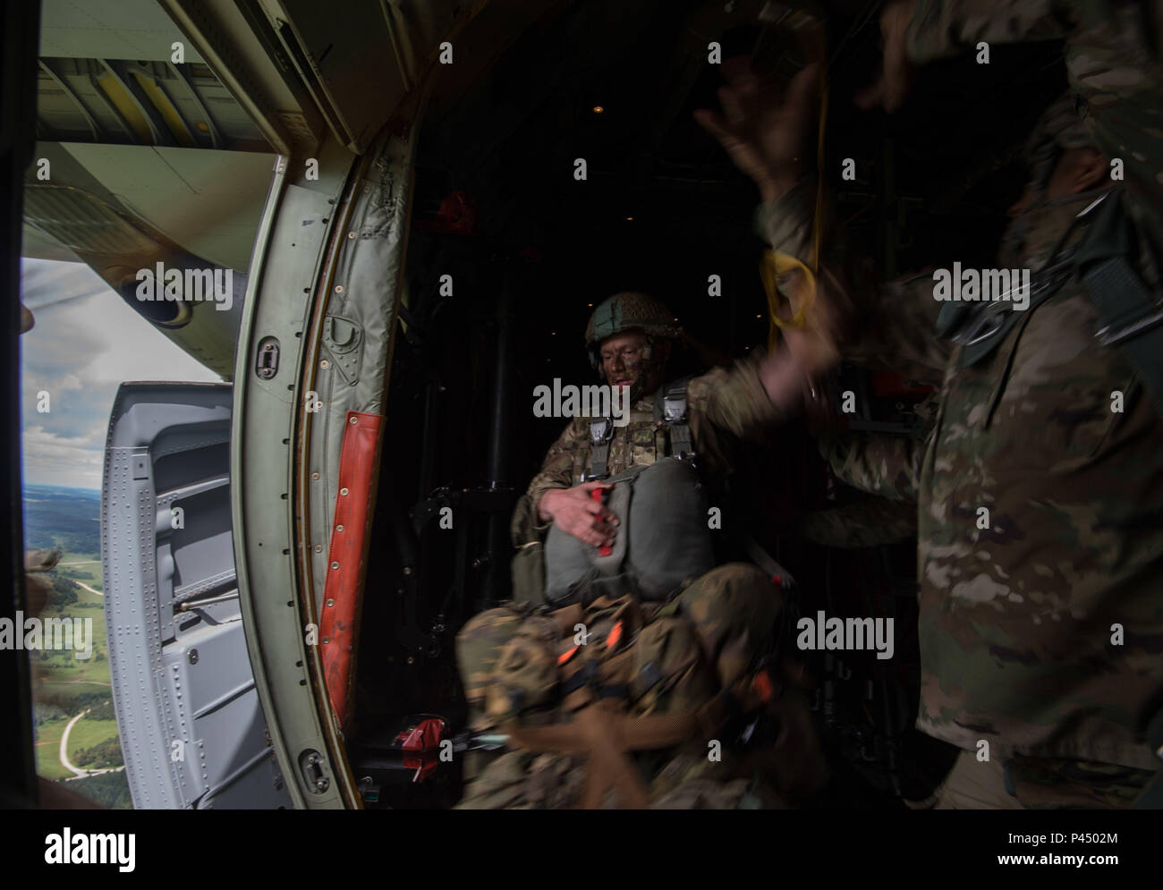 British army parachute regiment paratroopers conduct a static line jump ...