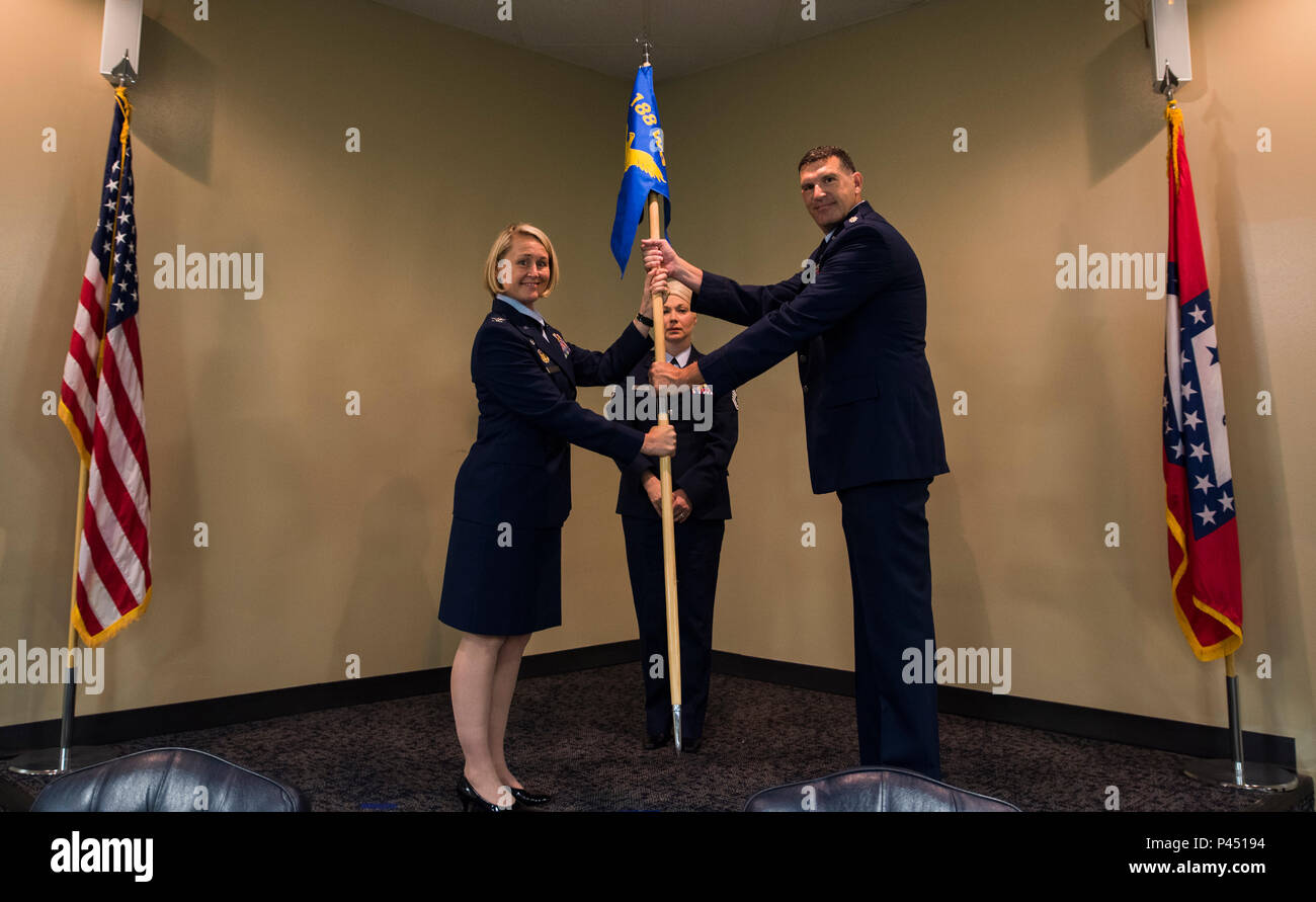Lt. Col. Leon Dodroe receives the flag from Col. Bobbi Doorenbos, 188th ...
