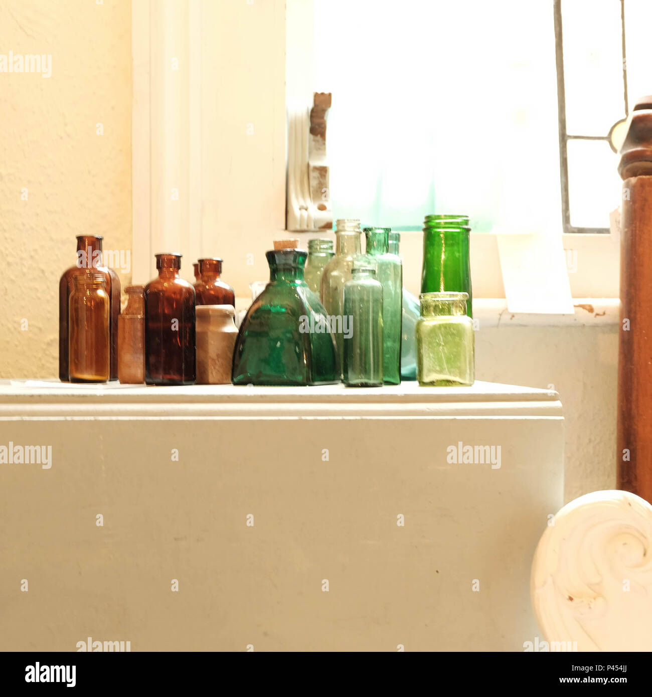 collection of bottles on a shelf Stock Photo - Alamy