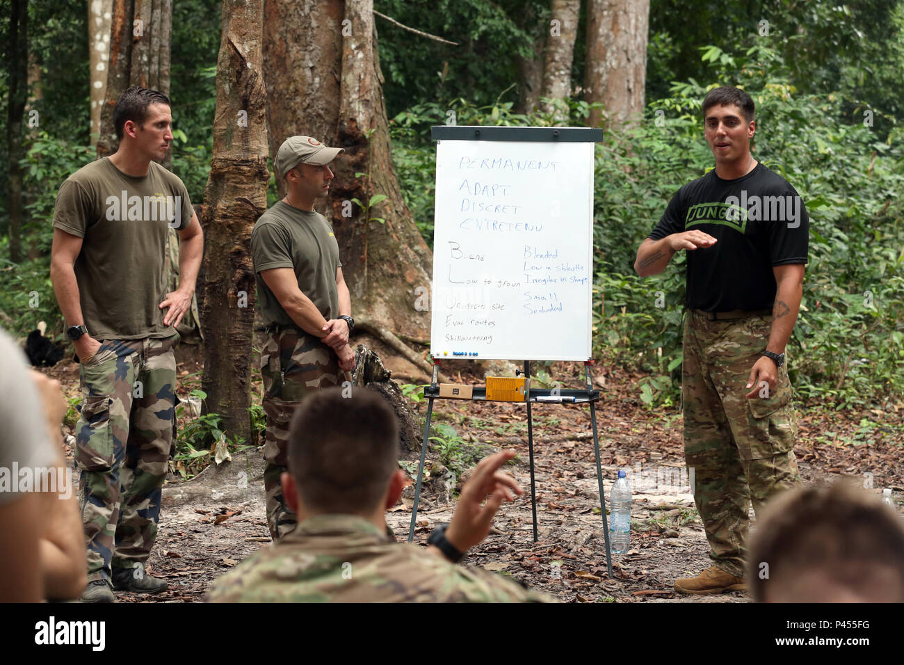 U.S. Army Staff Sgt. Larry Aviles (right), instructor at the U.S. Army ...