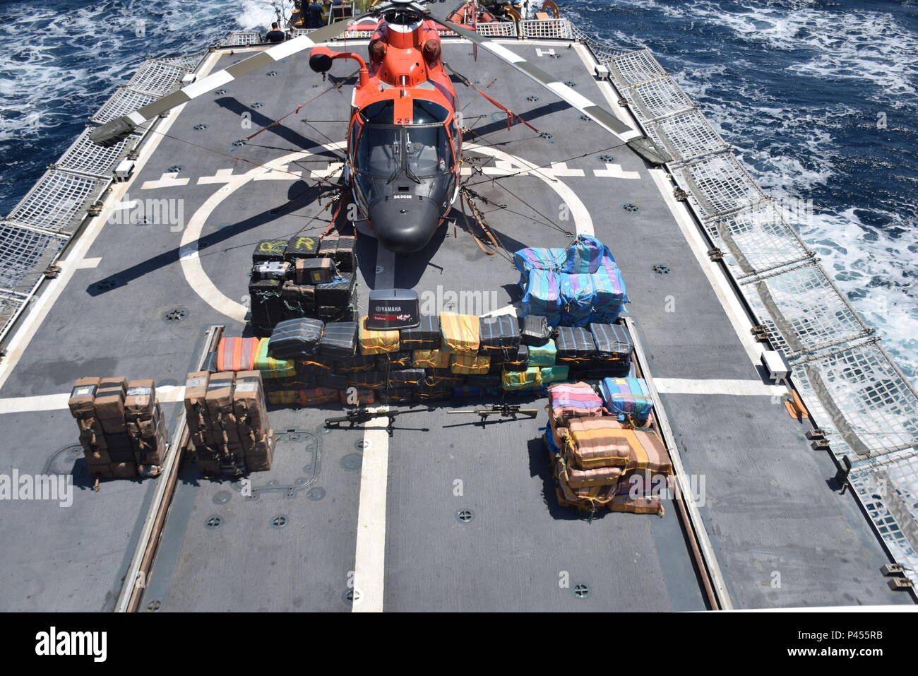 A Coast Guard Helicopter Interdiction Squadron MH-65 Dolphin helicopter ...
