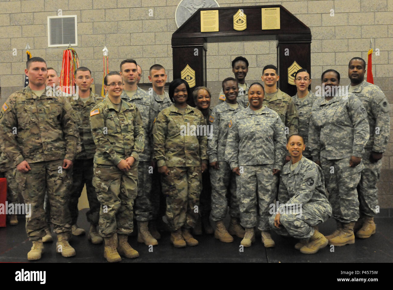 Army Reserve non-commissioned officers gather on stage in front of the ...