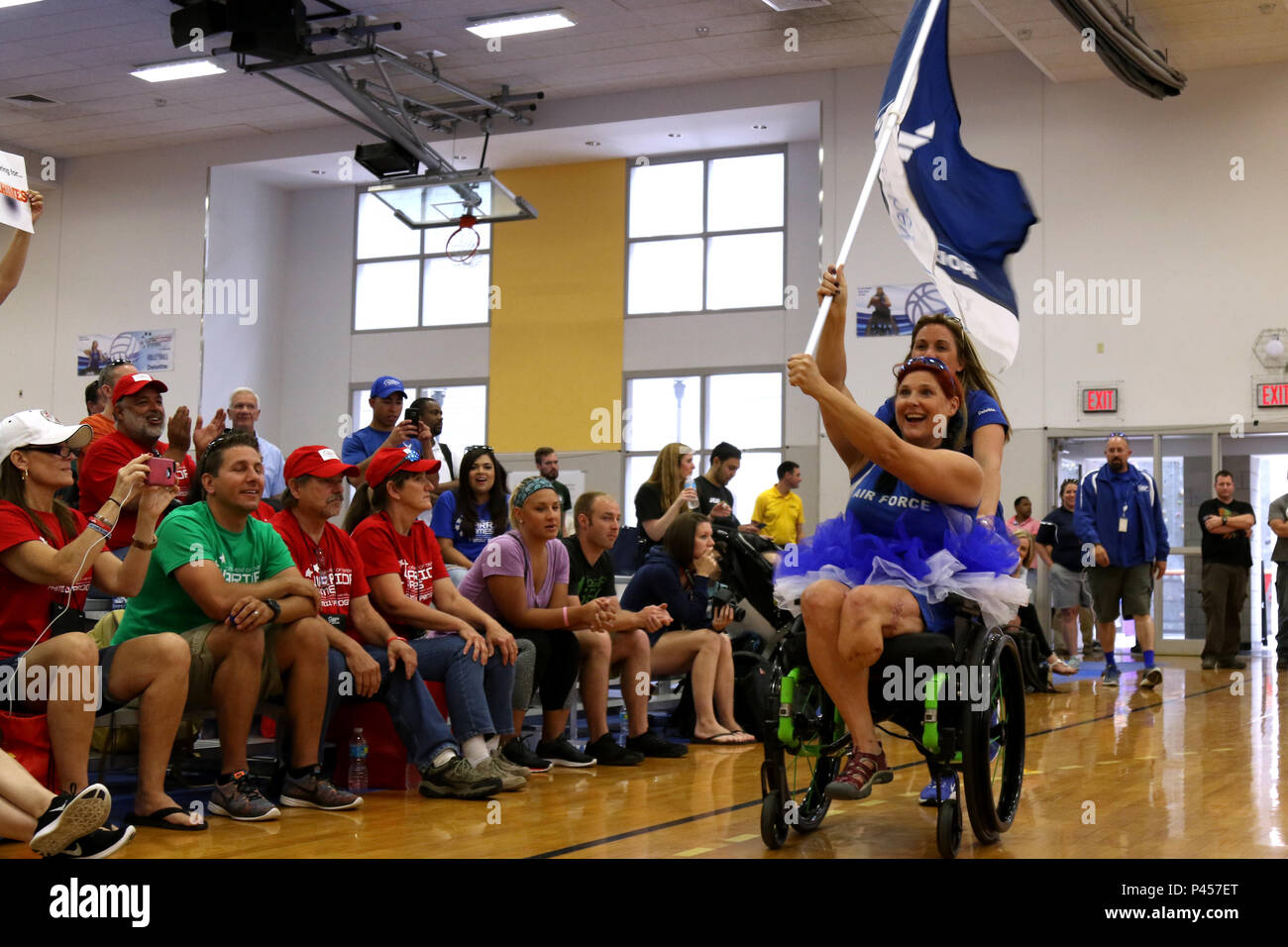 Air Force fans fly an Air Force Wounded Warrior flag during a sitting ...