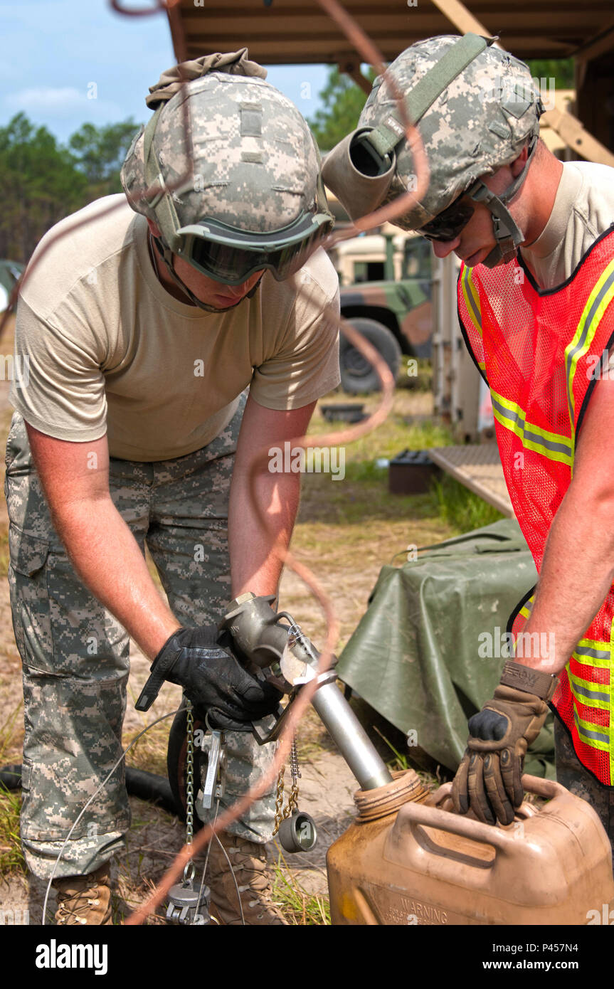 Spc. Paul Delucia, with the 192nd Quartermaster Company, based out of ...
