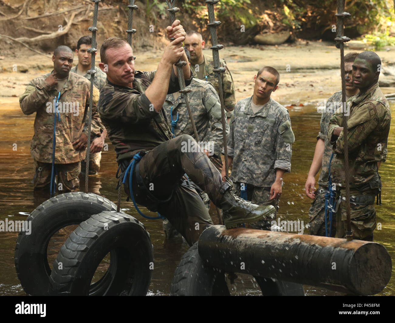 French Army instructors demonstrate obstacle completion techniques to U ...