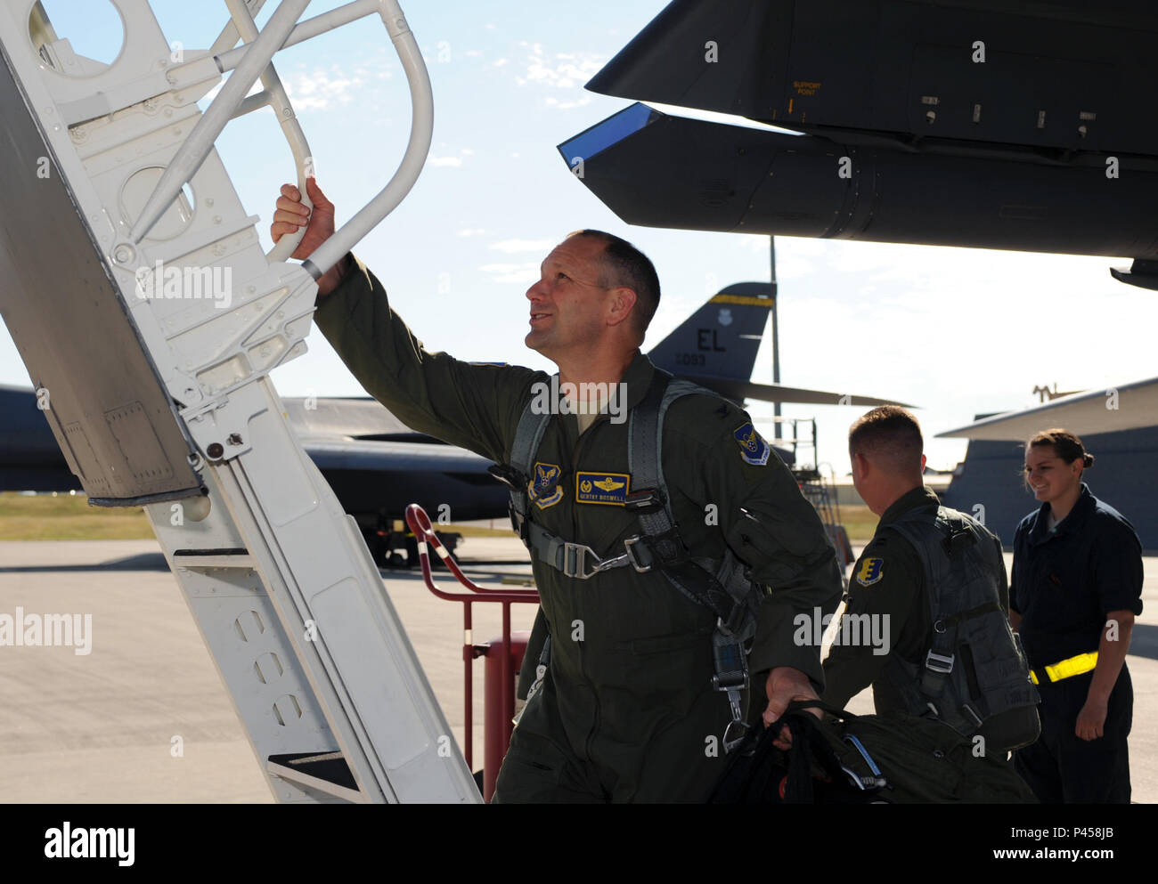 Col. Gentry Boswell, 28th Bomb Wing commander, boards a B-1 bomber to ...