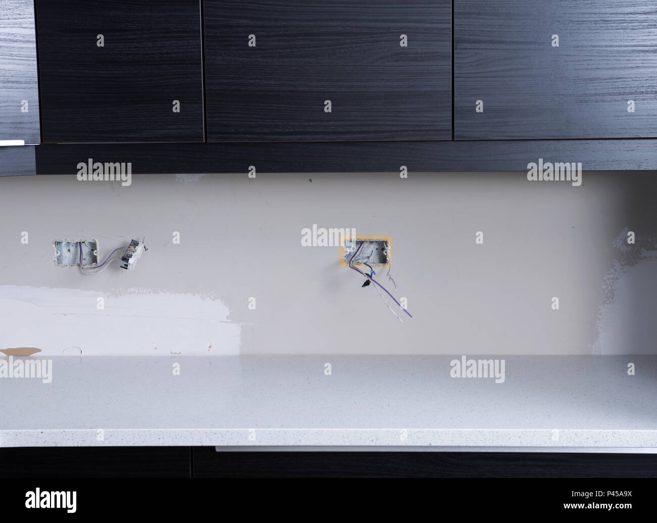 New kitchen cabinets and power wiring installation in house under ...