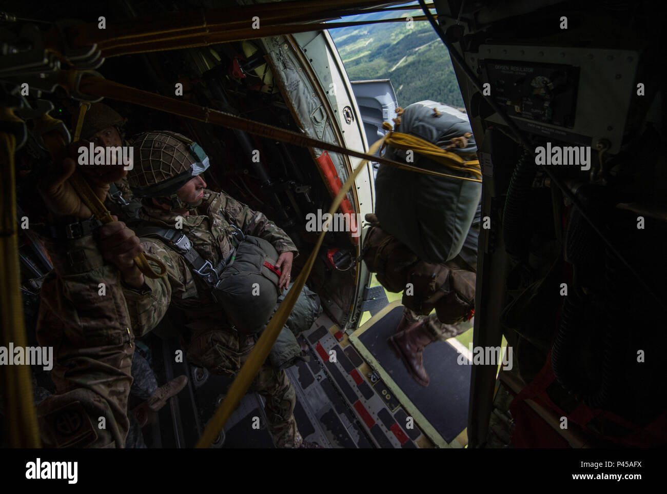 British army parachute regiment paratroopers conduct a static line jump ...