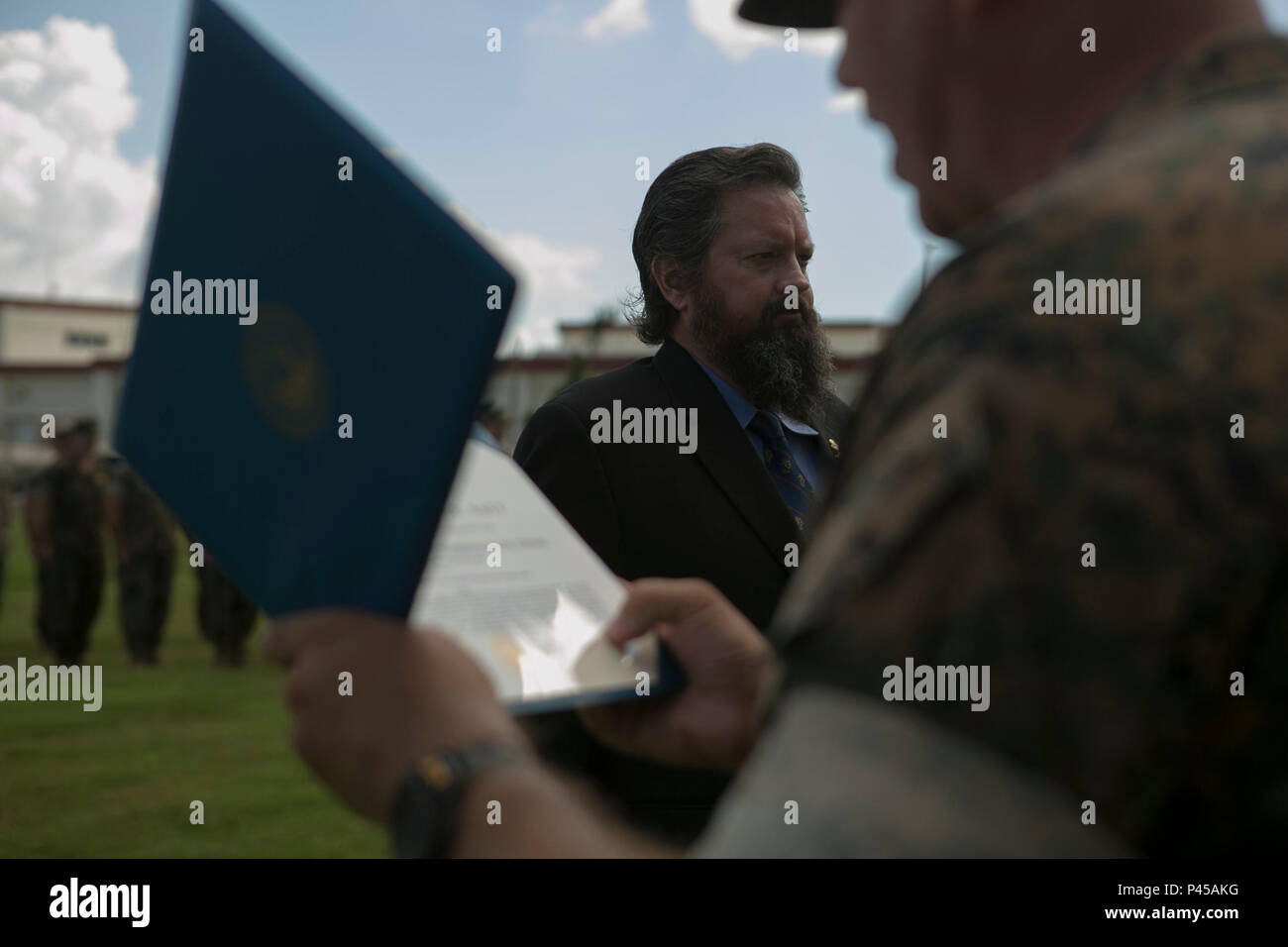 Retired Master Sgt. Robert Alexander Jr. receives his fourth Navy and ...