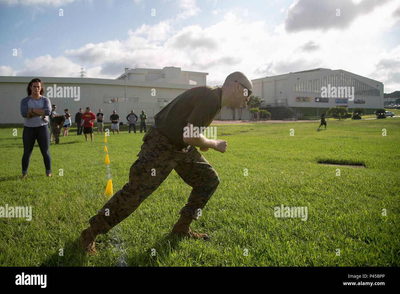 Lt. Col. Seth Wolcott performs a sprint while competing in a High ...