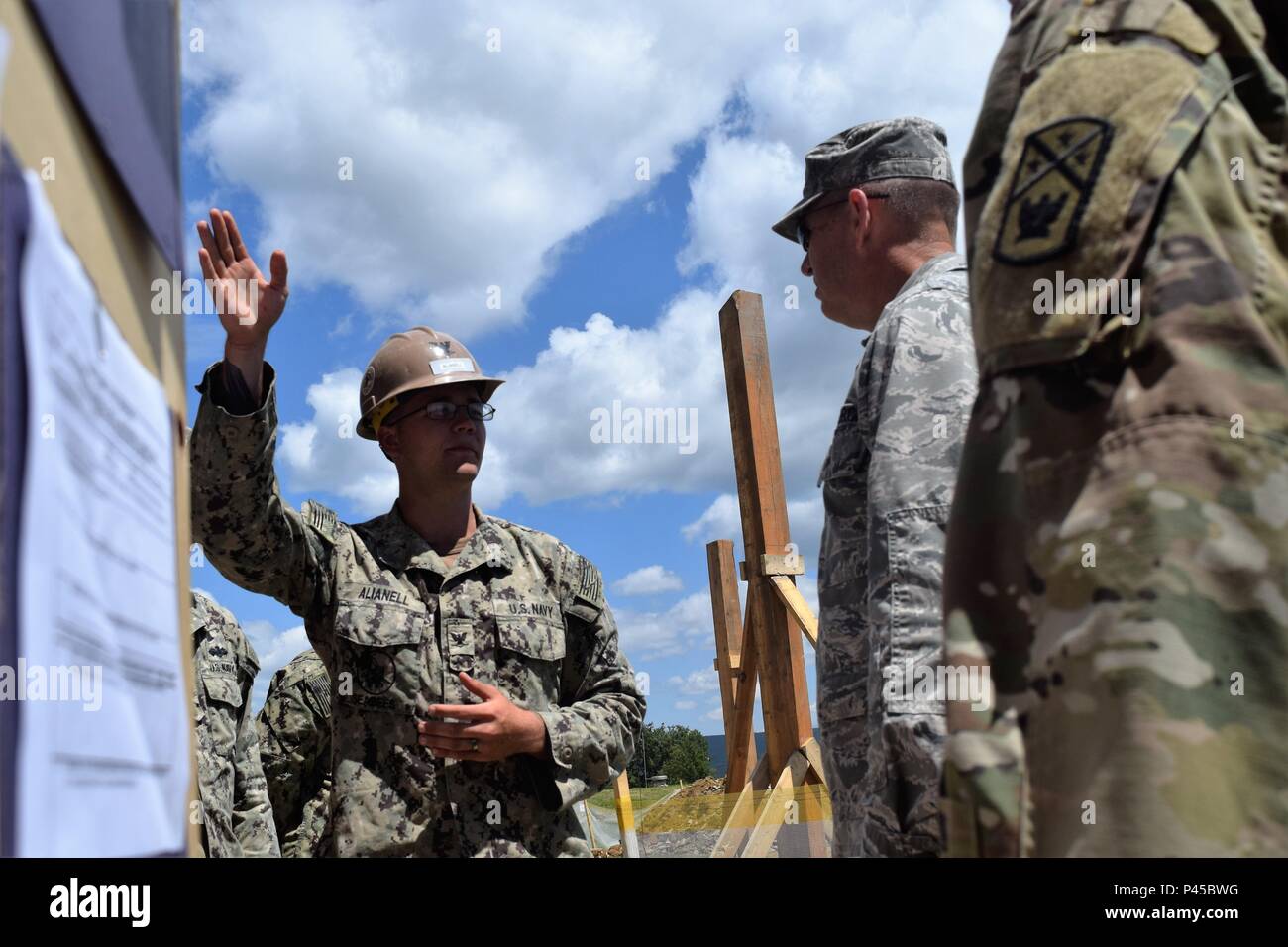 Brig. Gen. Donald L. Johnson (center), the Assistant Adjutant General ...