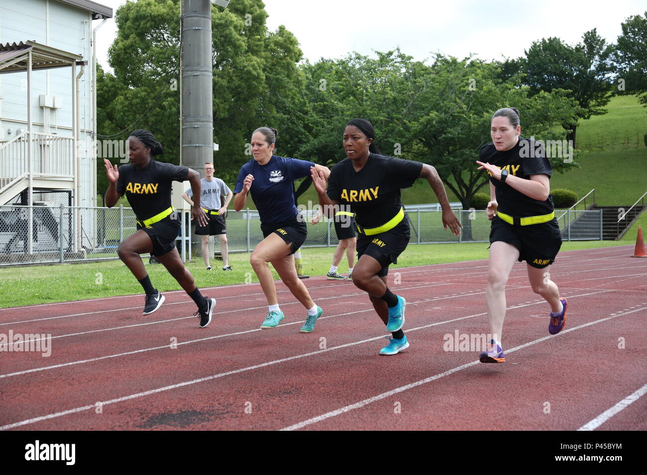 Soldiers compete in the 100-meter dash June 17 for Camp Zama’s Army ...