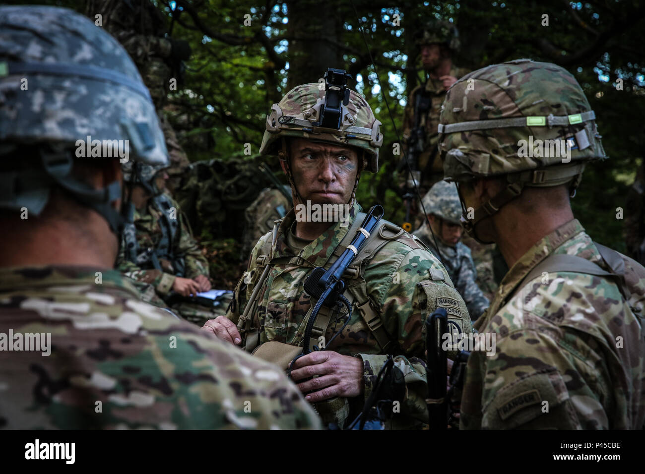 U.S Army Col. Colin Tuley, center, Brigade Commander of 1st Brigade ...
