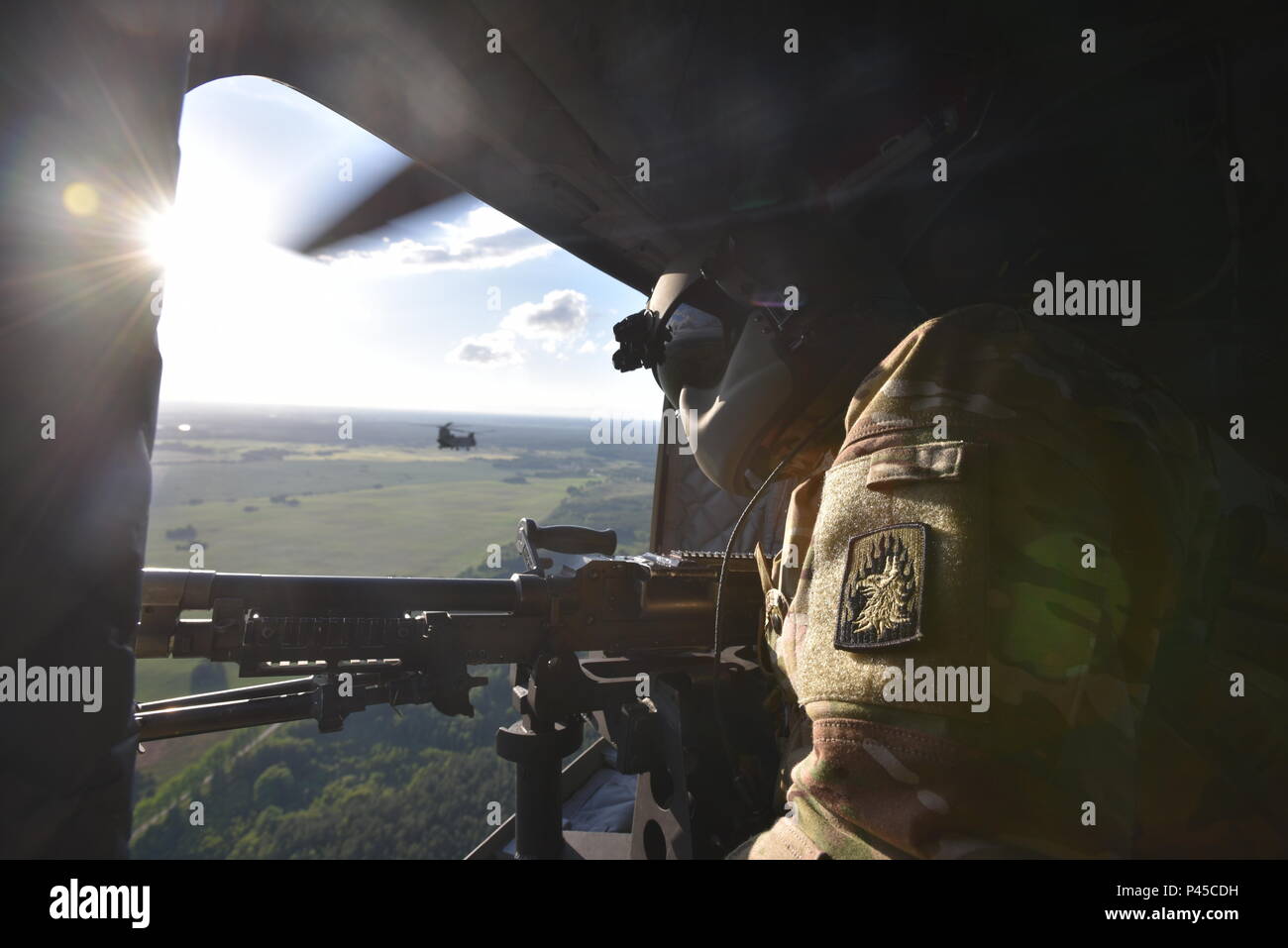 Sgt. Michael Hagen, a 15U CH-47 Chinook Crew Chief, from Hotel Company ...