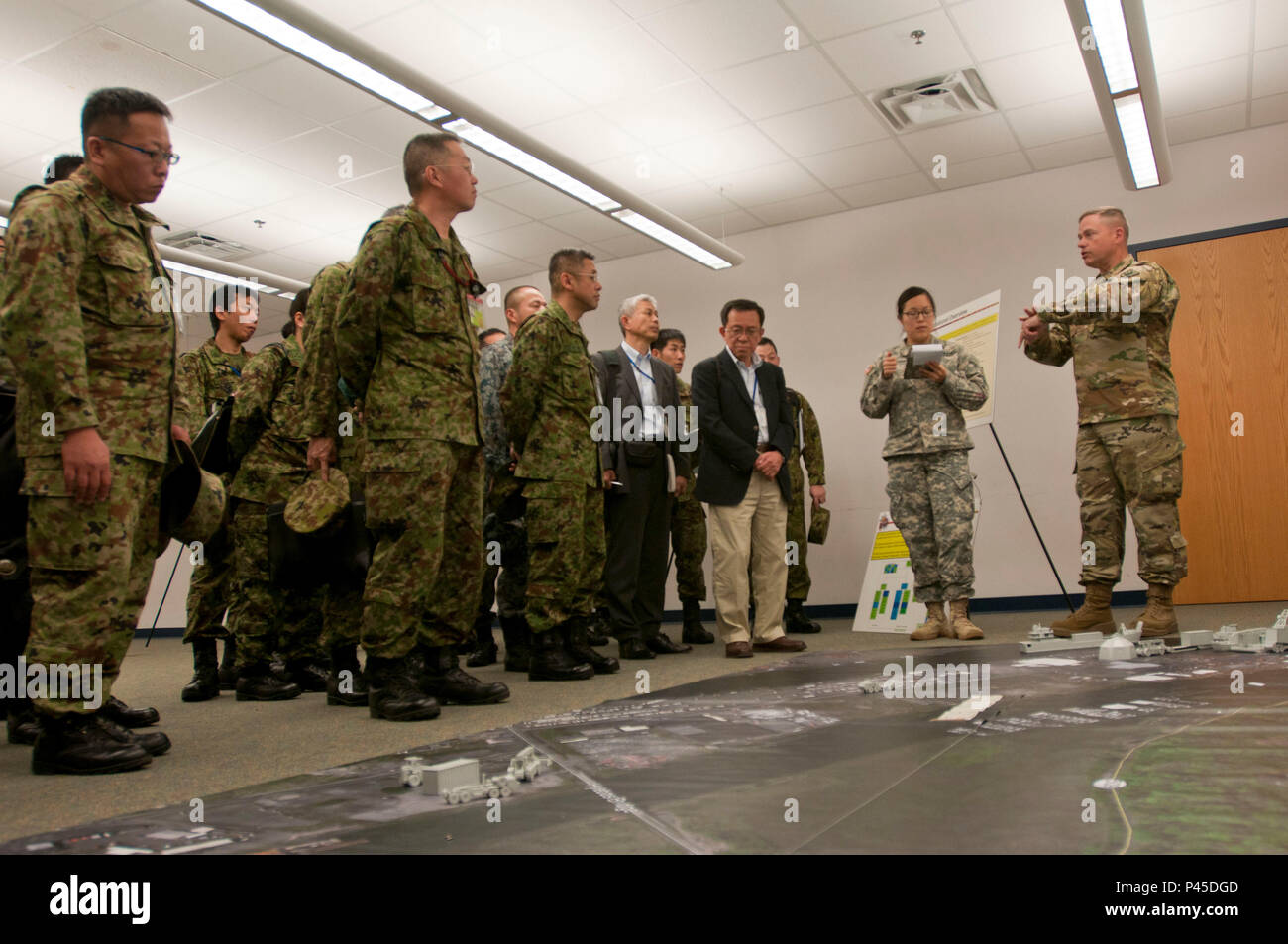 Col. Stacy Townsend, the Joint Task Force Seven commander, goes over ...