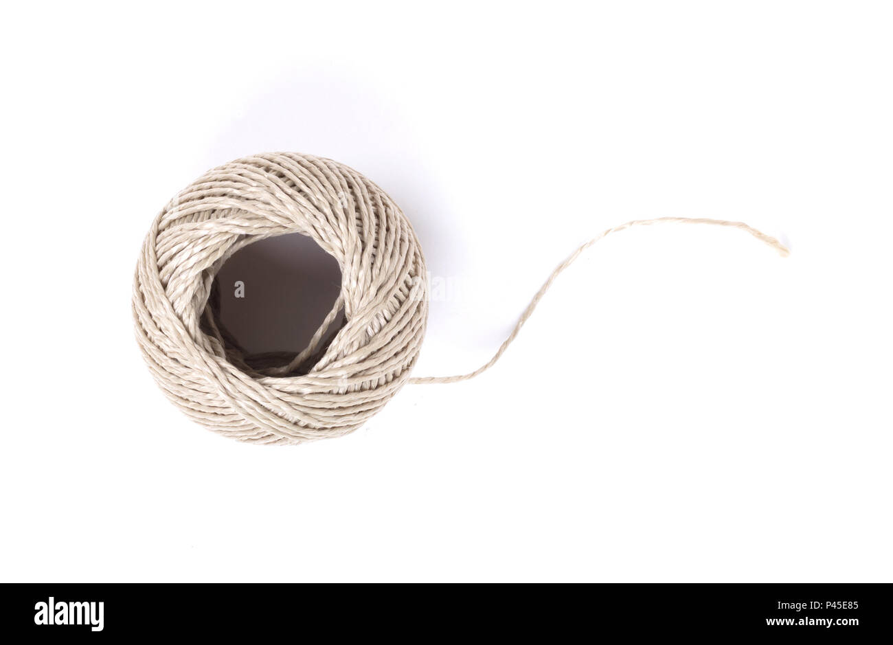 Small ball of rope isolated on a white background Stock Photo - Alamy