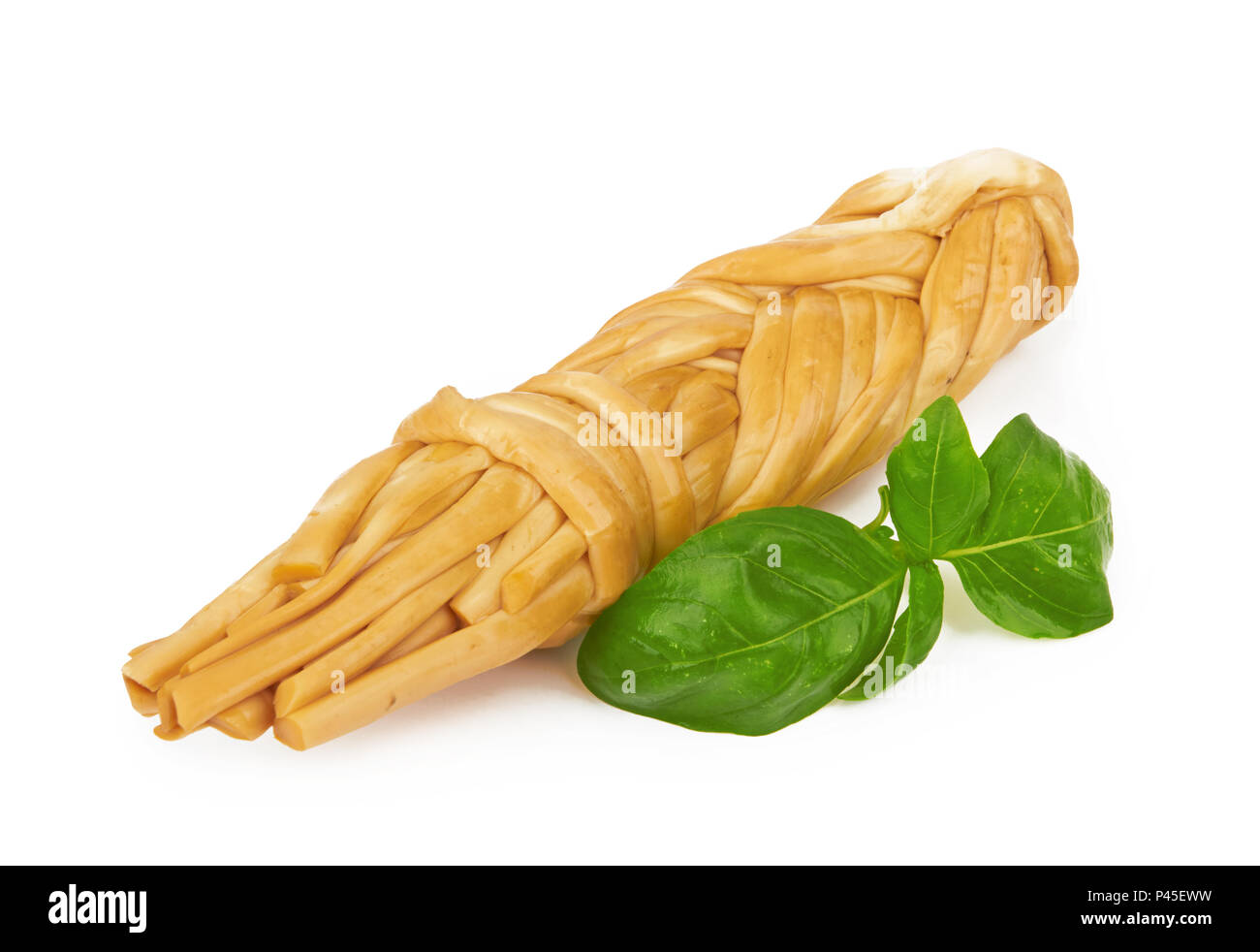 Smoked braided cheese isolated on white background Stock Photo - Alamy
