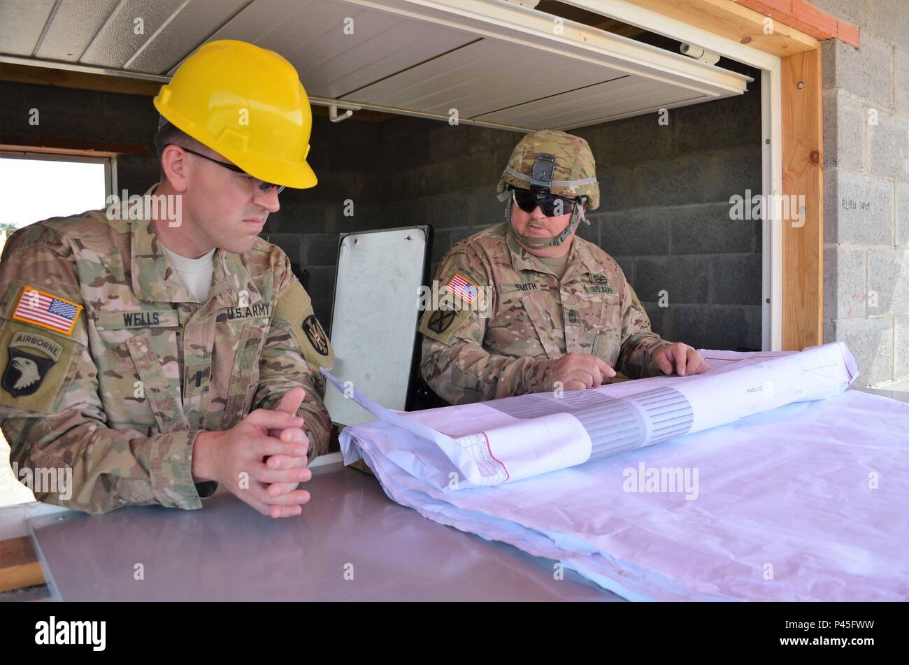1st Lt. Mason Wells and 1st Sgt. Eddie Smith, engineers, 1151st Engineer Company, Alabama ...