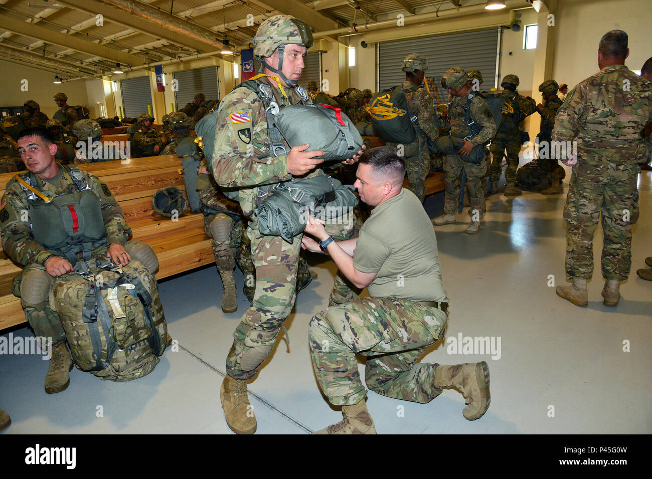 U.S. Army Sgt. 1st Class Joseph Crotty, a jumpmaster assigned to the ...
