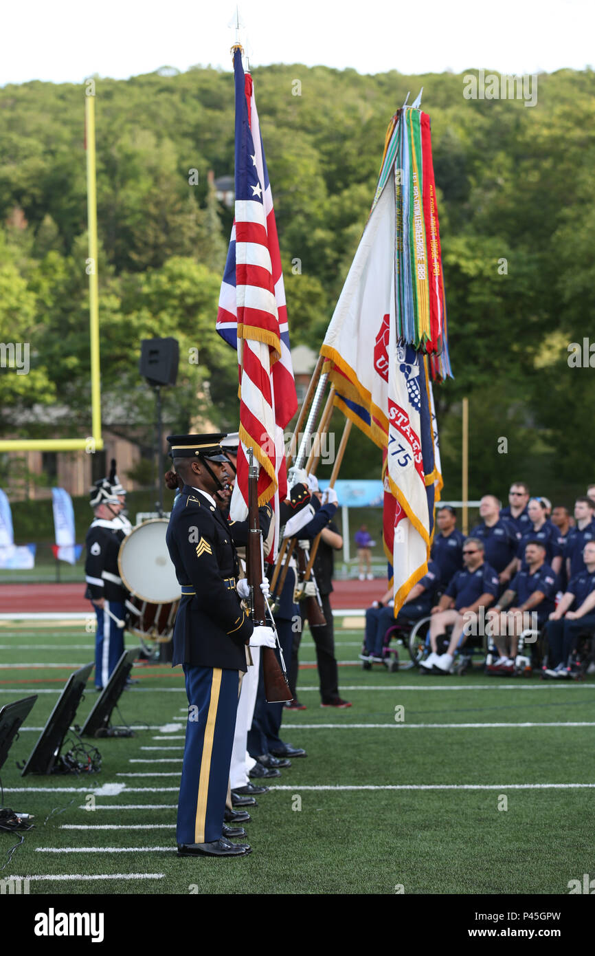 The Color Guard presents the colors during the National Anthem for the ...