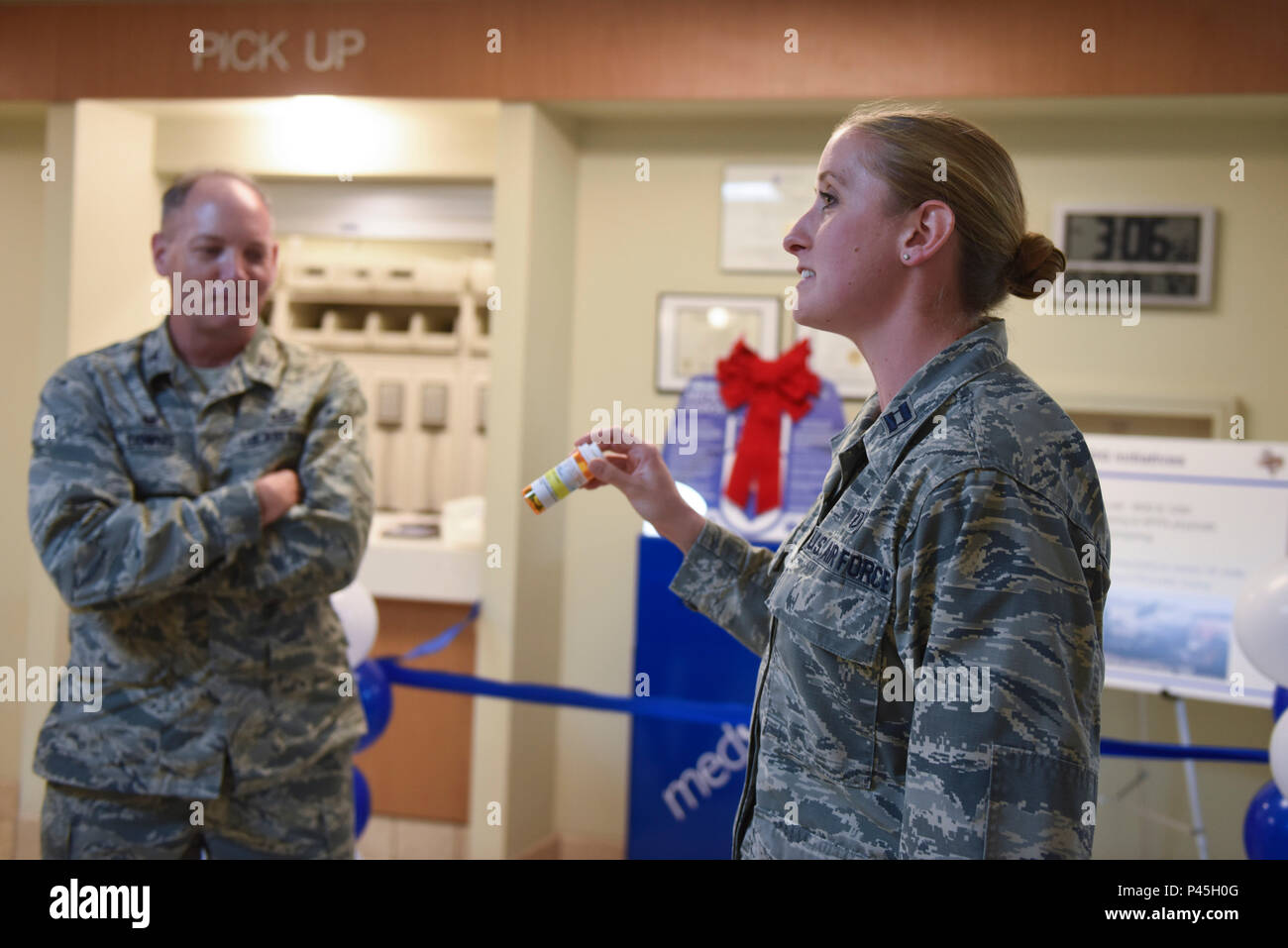 U.S. Air Force Col. Michael Downs, 17th Training Wing Commander, and Capt. Aubrie Wnek, 17th ...