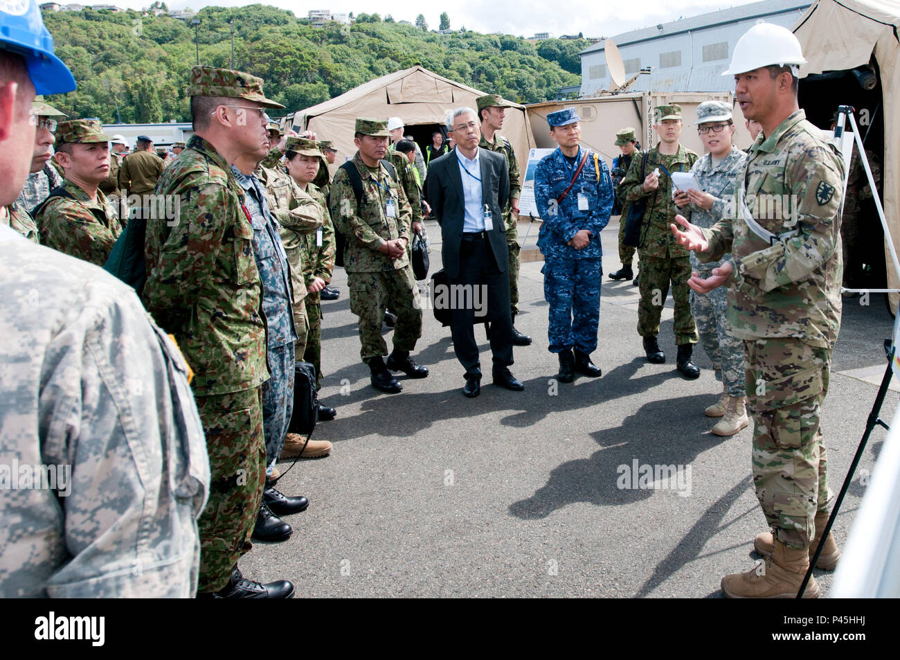In this image at the Port of Tacoma, U.S. Army transportation personnel ...